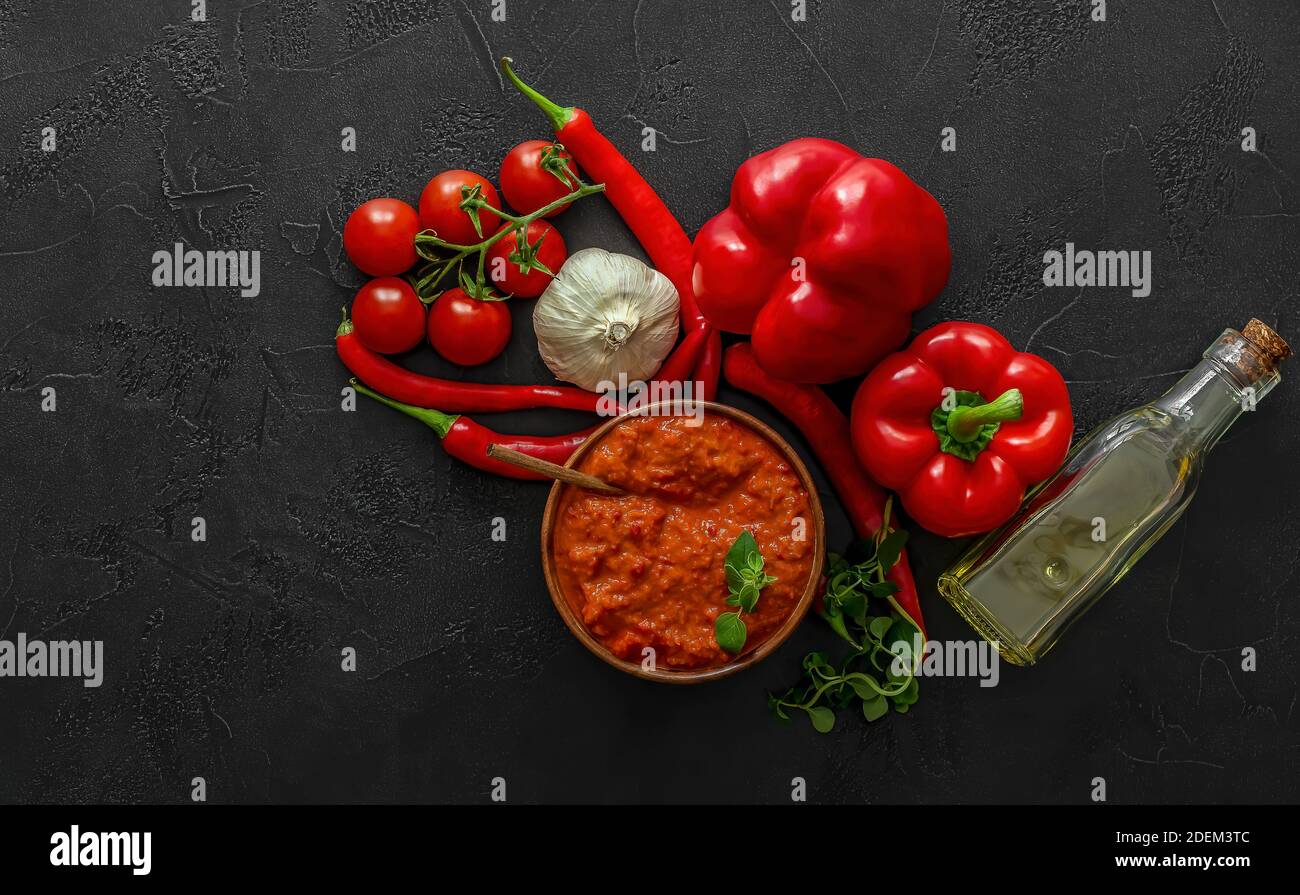 Traditional autumn Balkan vegan spread Ajvar or Aivar with ingredients ...