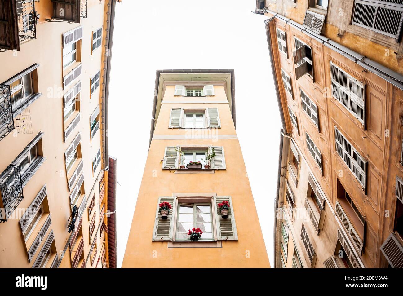 Looking up at traditional apartments in the old quarter of Nice France ...