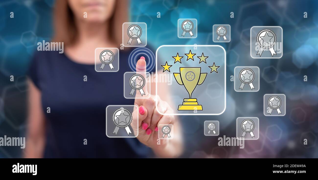 Woman touching a quality concept on a touch screen with her finger ...