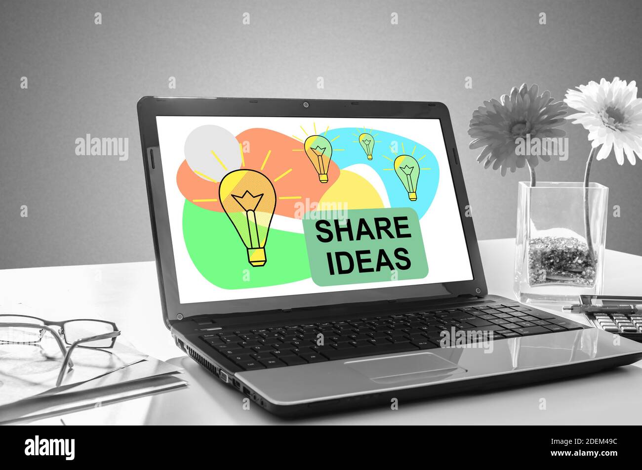 Laptop screen showing share ideas concept Stock Photo - Alamy