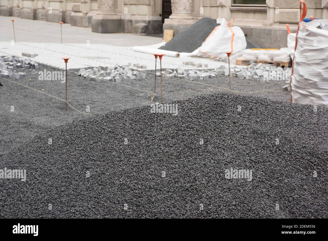 stone paving in road construction, public road network for mobility ...