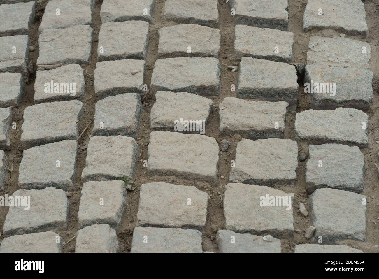 stone paving in road construction, public road network for mobility ...