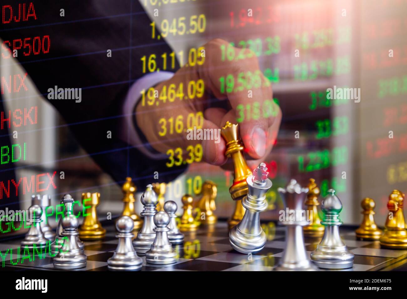 Chess game on chess board behind business man background. Business ...