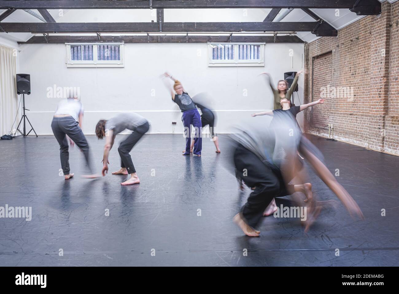 Group of people dancing blurred movement Stock Photo - Alamy