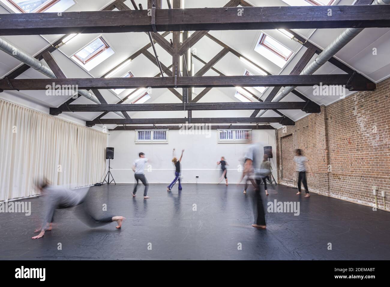 Group of people dancing blurred movement Stock Photo - Alamy