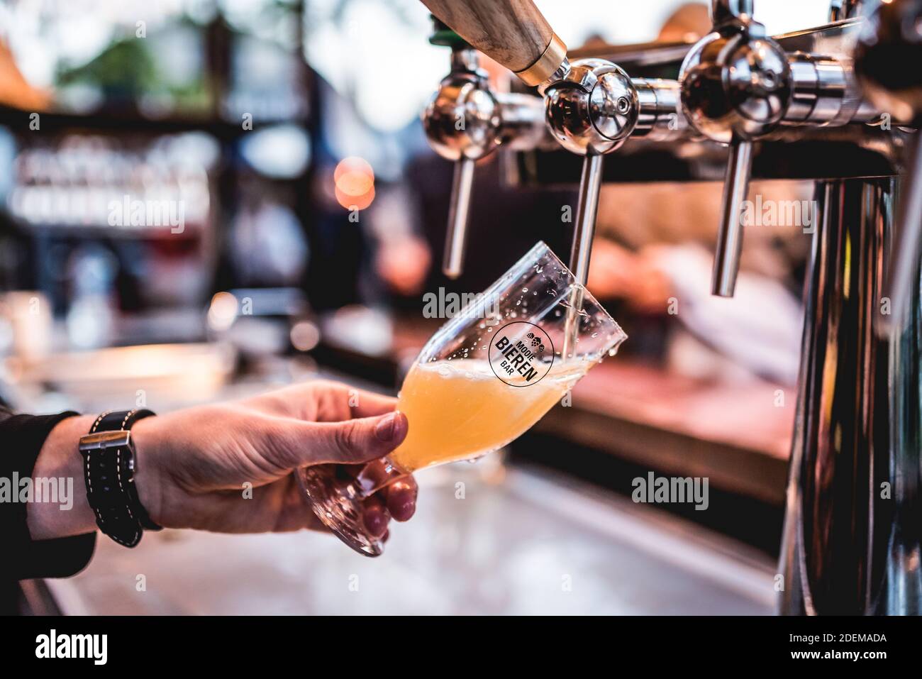 bartender pouring craft beer with foam Stock Photo - Alamy