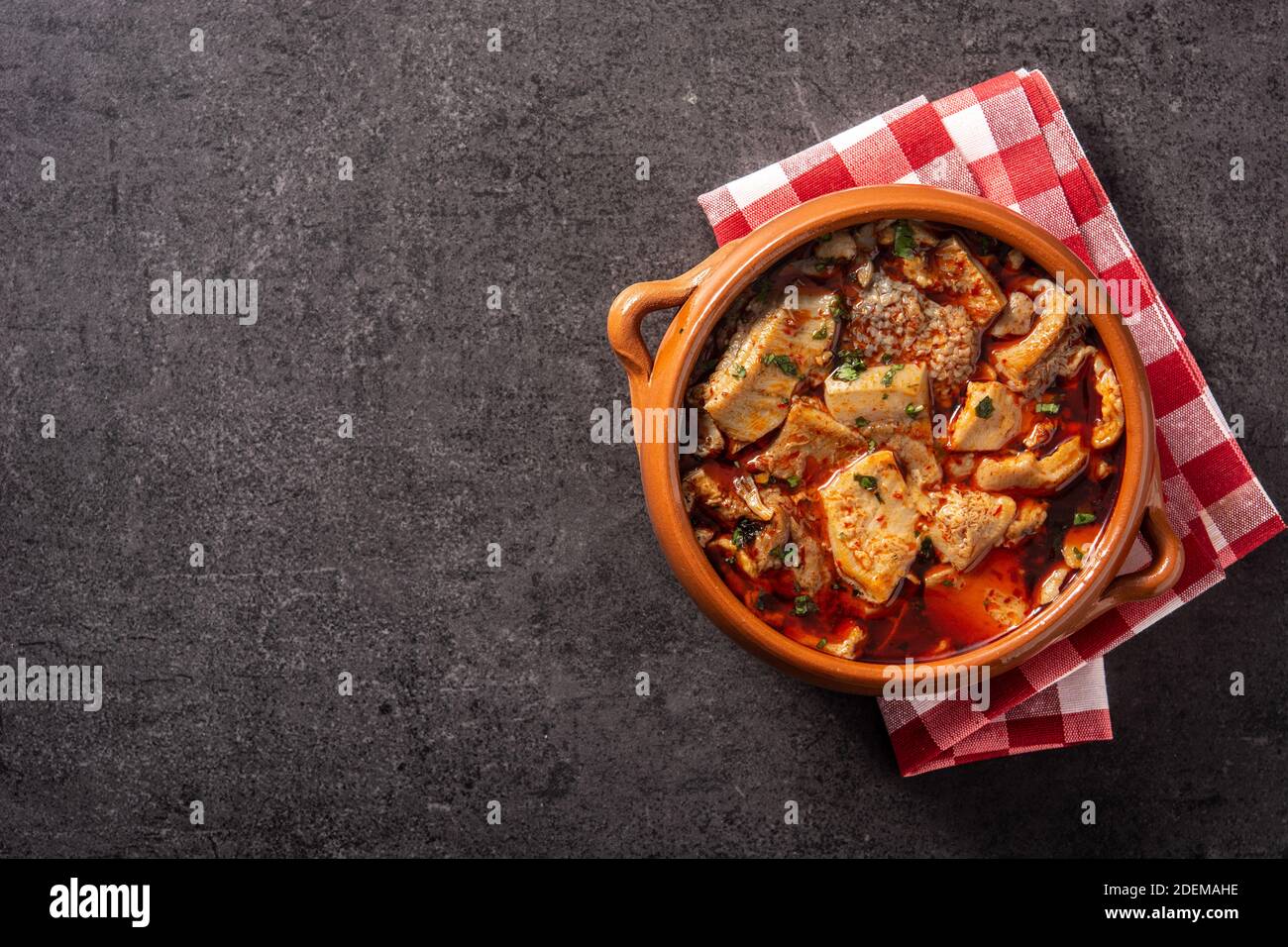 Traditional mondongo or el menudo soup on black background Stock Photo ...