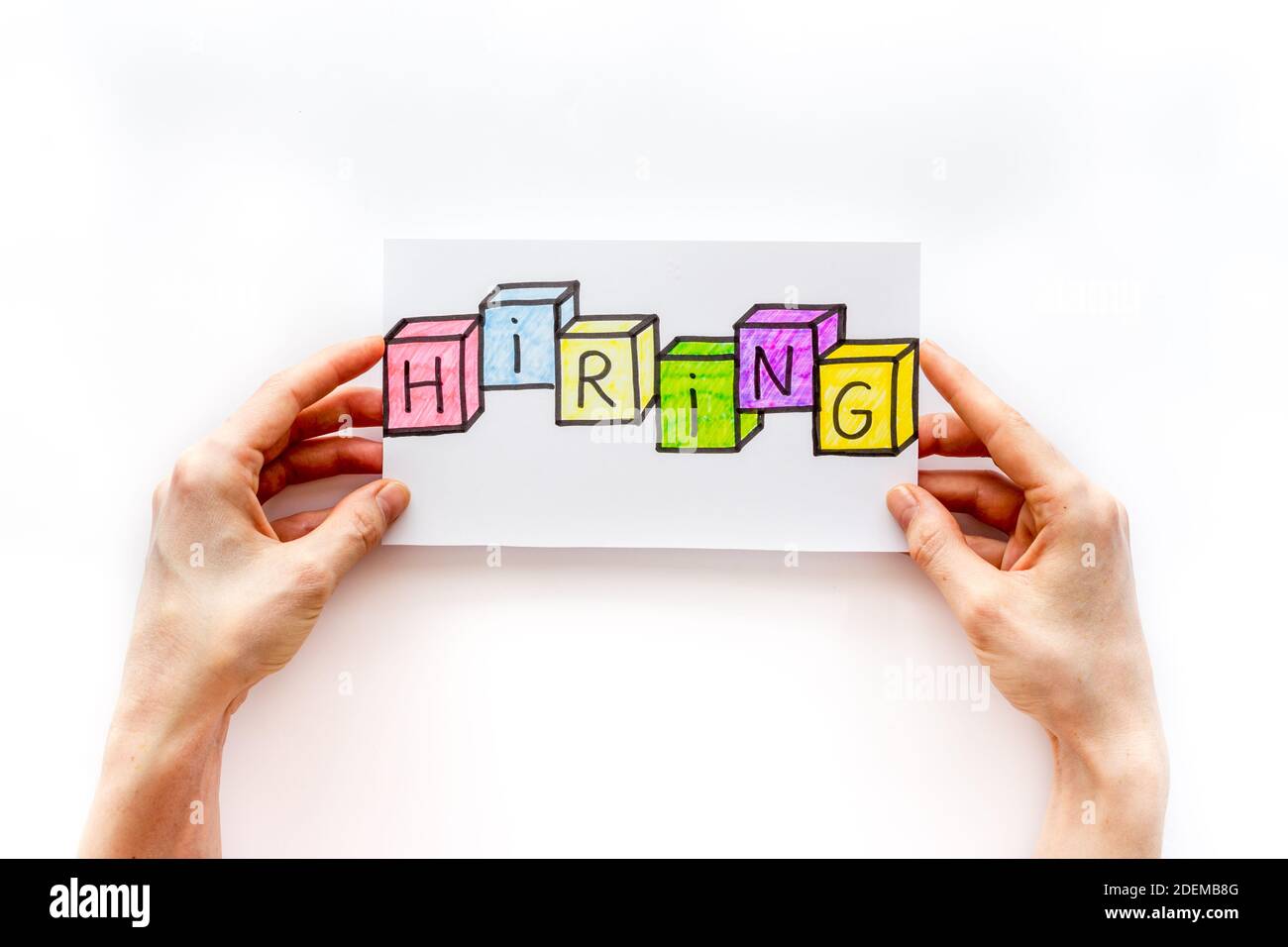 Hiring - job recruting concept. Word Hiring on paper banner, top view ...