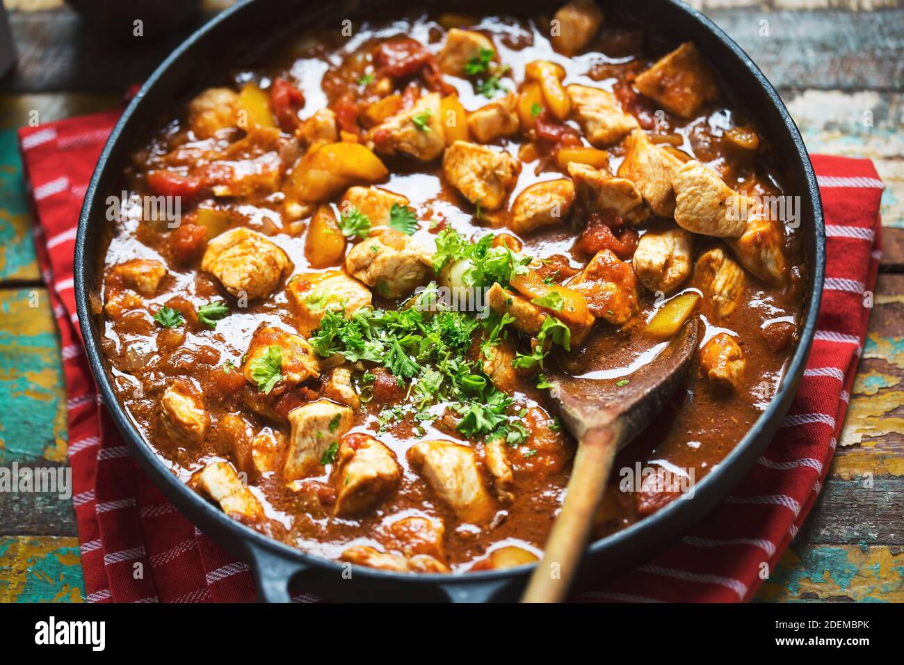 Chicken paneer with indian spices. Chicken pieces with yellow pepper in ...