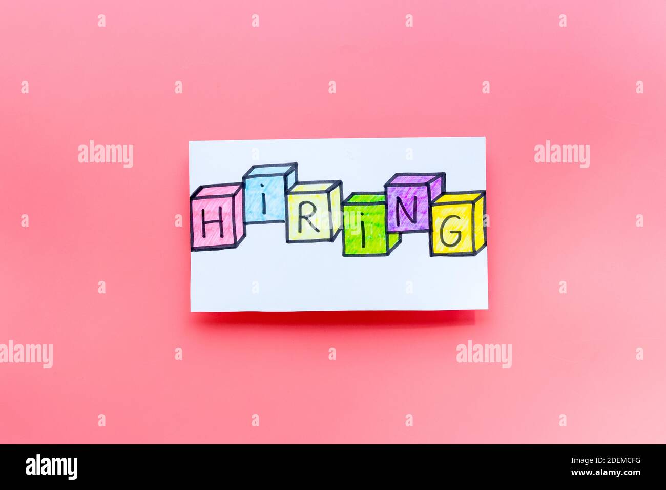Hiring - job recruting concept. Word Hiring on paper banner, top view ...
