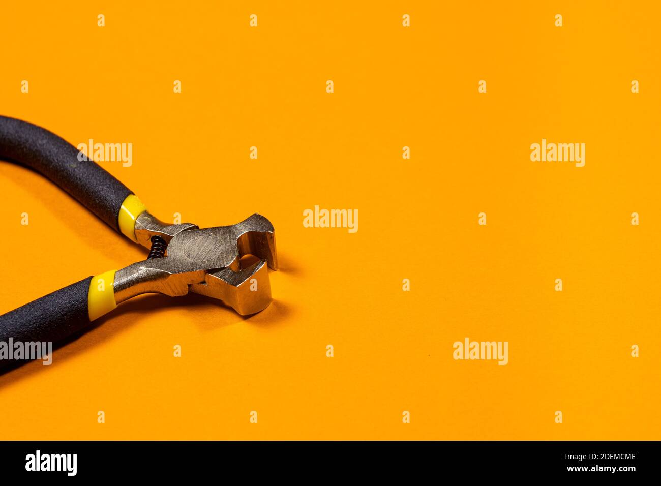 The construction tool ticks metal steel with a black handle on an ...