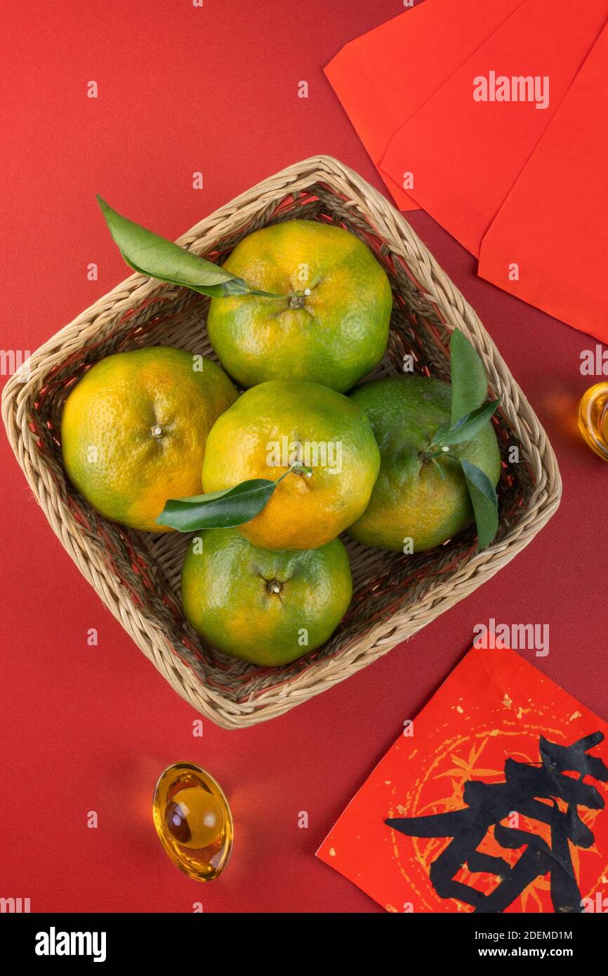Top view of fresh ripe tangerine mandarin orange with fresh leaves on ...
