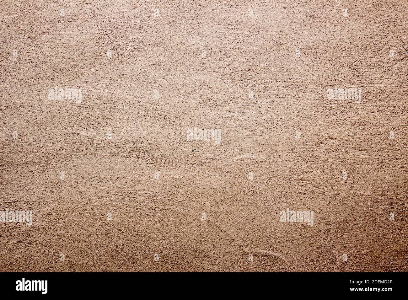 Beige colored abstract wall texture background in different shades of ...