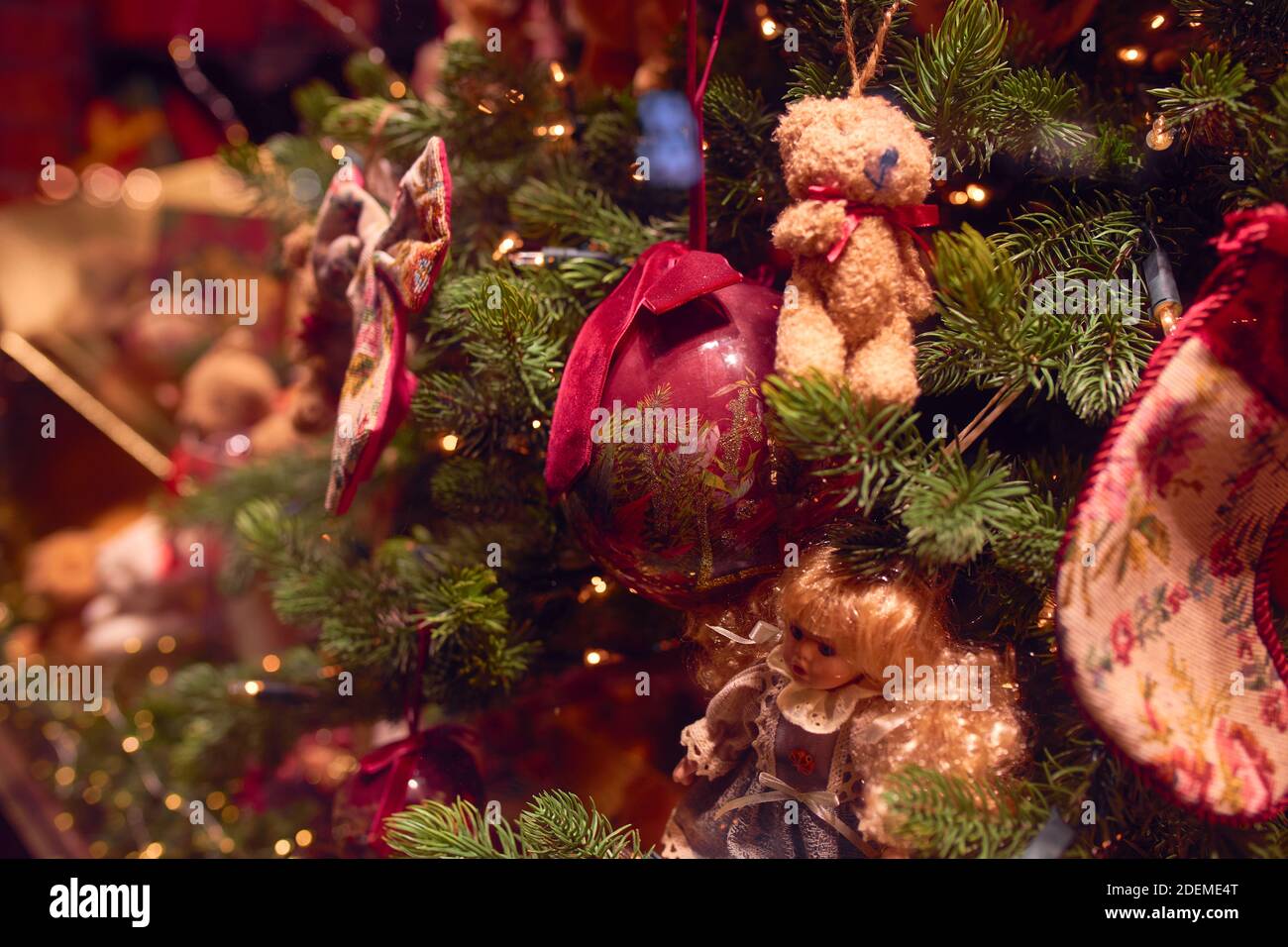 Christmas fir tree decorations with baubles and lights Stock Photo - Alamy
