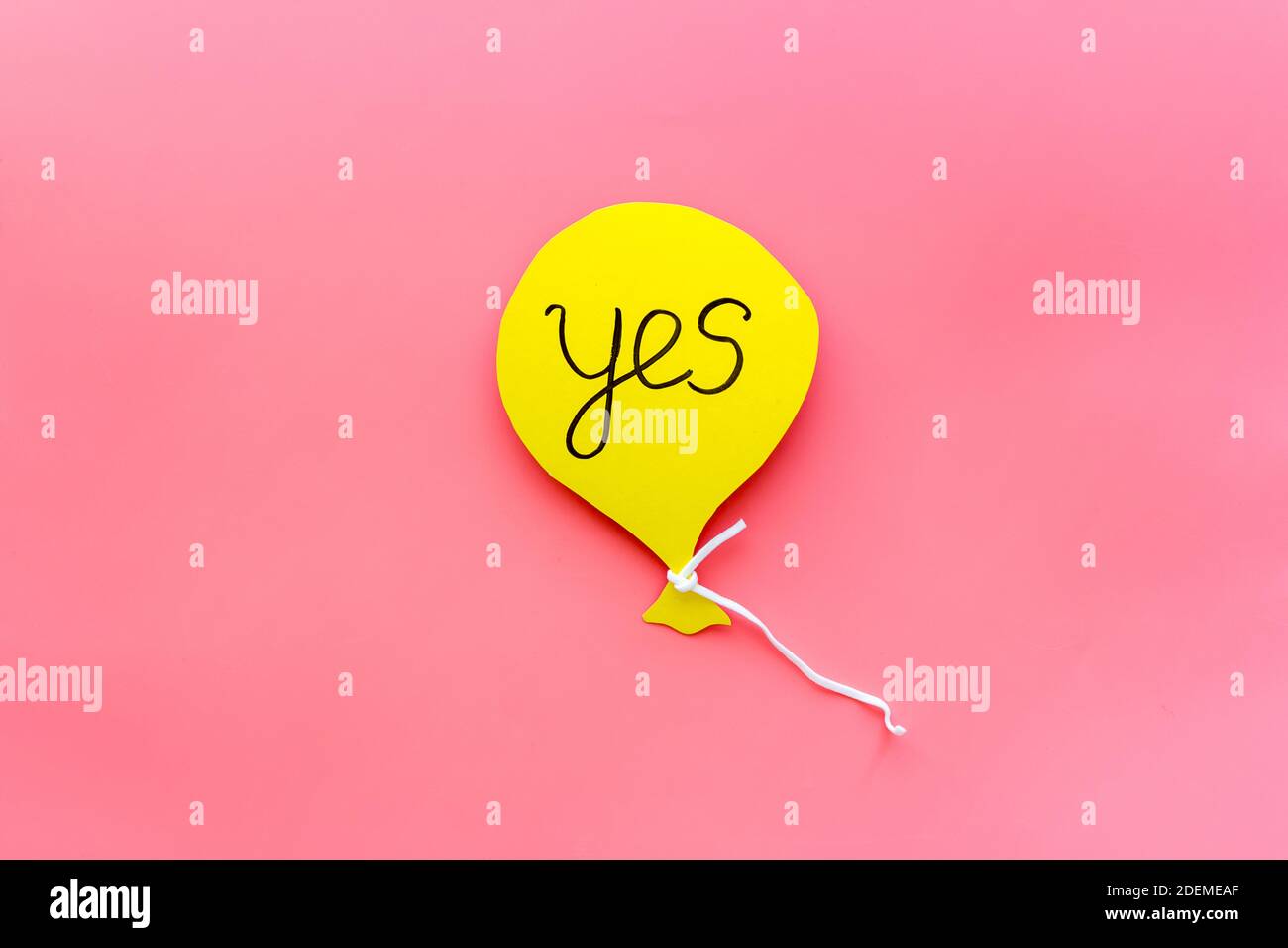 Yes agreement - decision concept. Word Yes on paper banner, top view ...