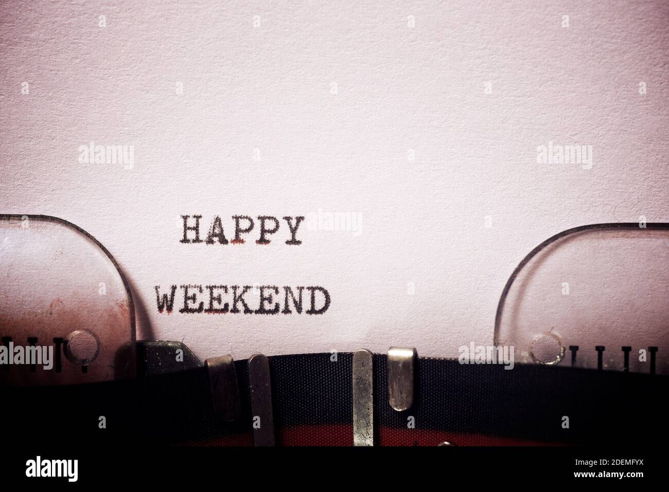 Happy weekend phrase written with a typewriter Stock Photo - Alamy