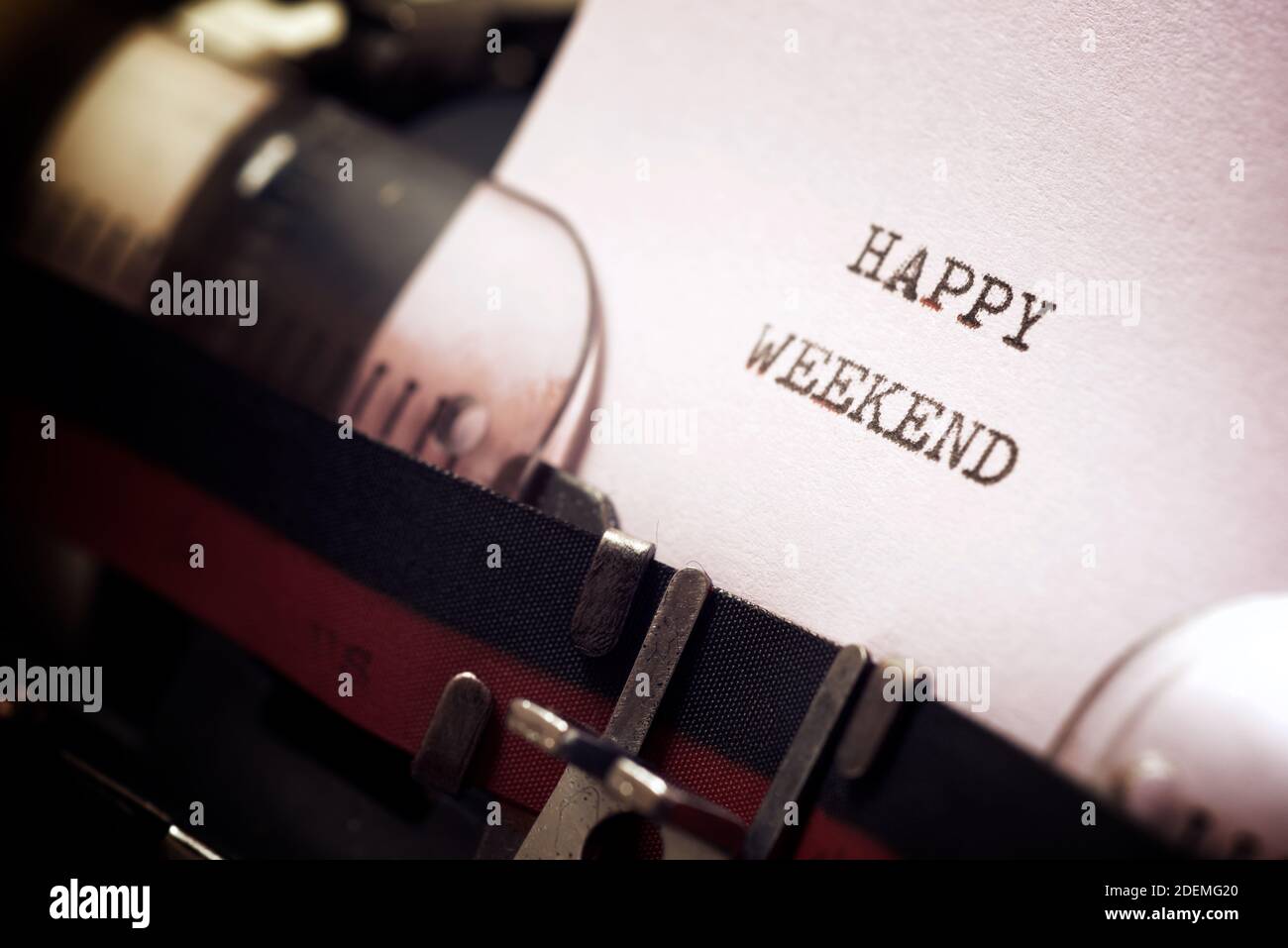 Happy weekend phrase written with a typewriter Stock Photo - Alamy