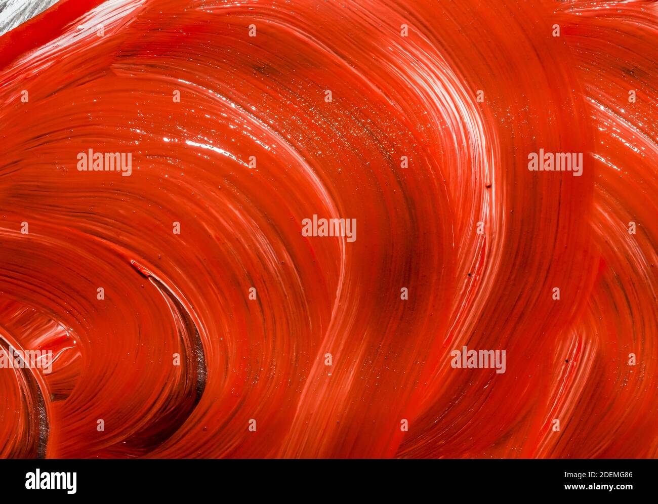 Abstract backdrop photo of red and yellow oil paint colors on canvas ...