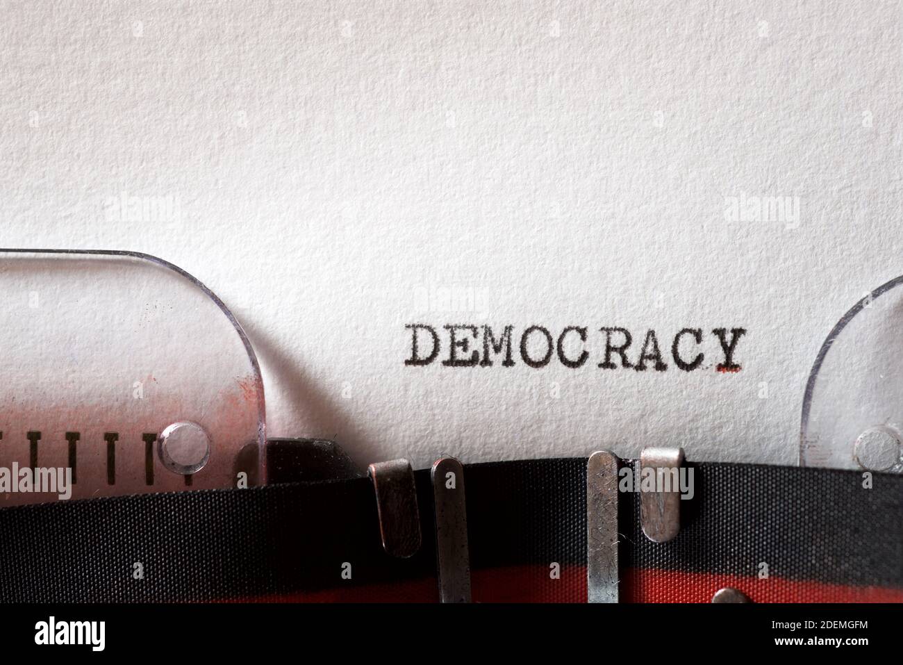 Democracy word written with a typewriter Stock Photo - Alamy