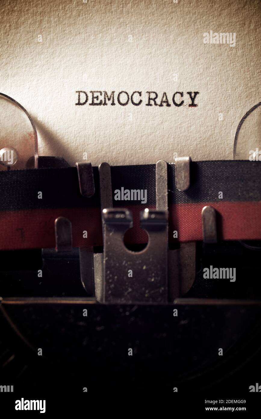 Democracy word written with a typewriter Stock Photo - Alamy