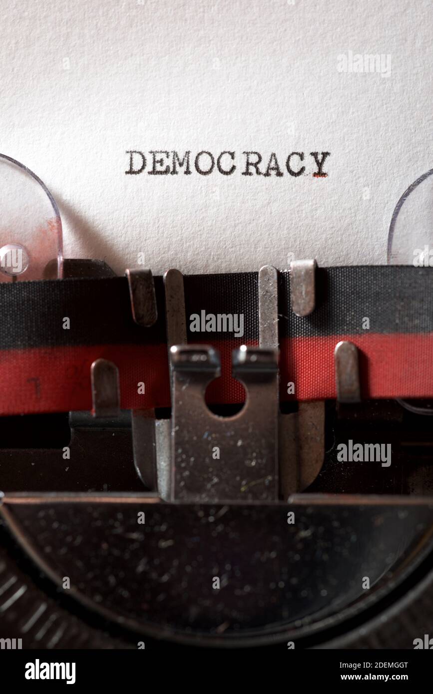 Democracy word written with a typewriter Stock Photo - Alamy