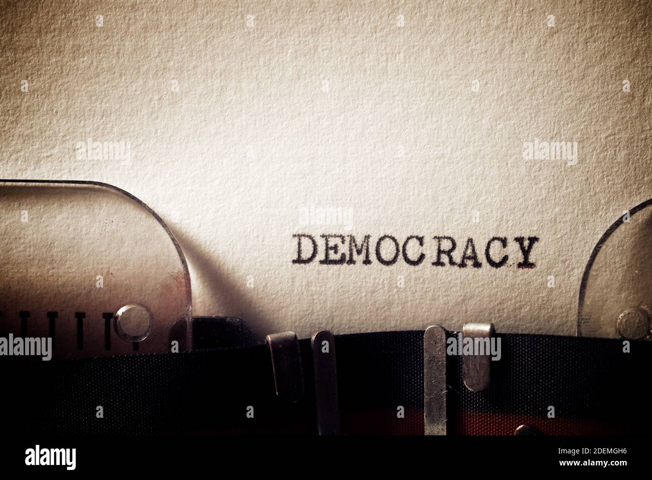 Democracy word written with a typewriter Stock Photo - Alamy