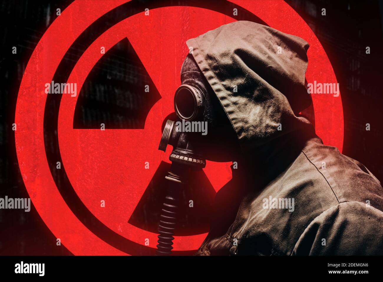 Stalker warrior in protective soviet gas mask standing on glowing red ...