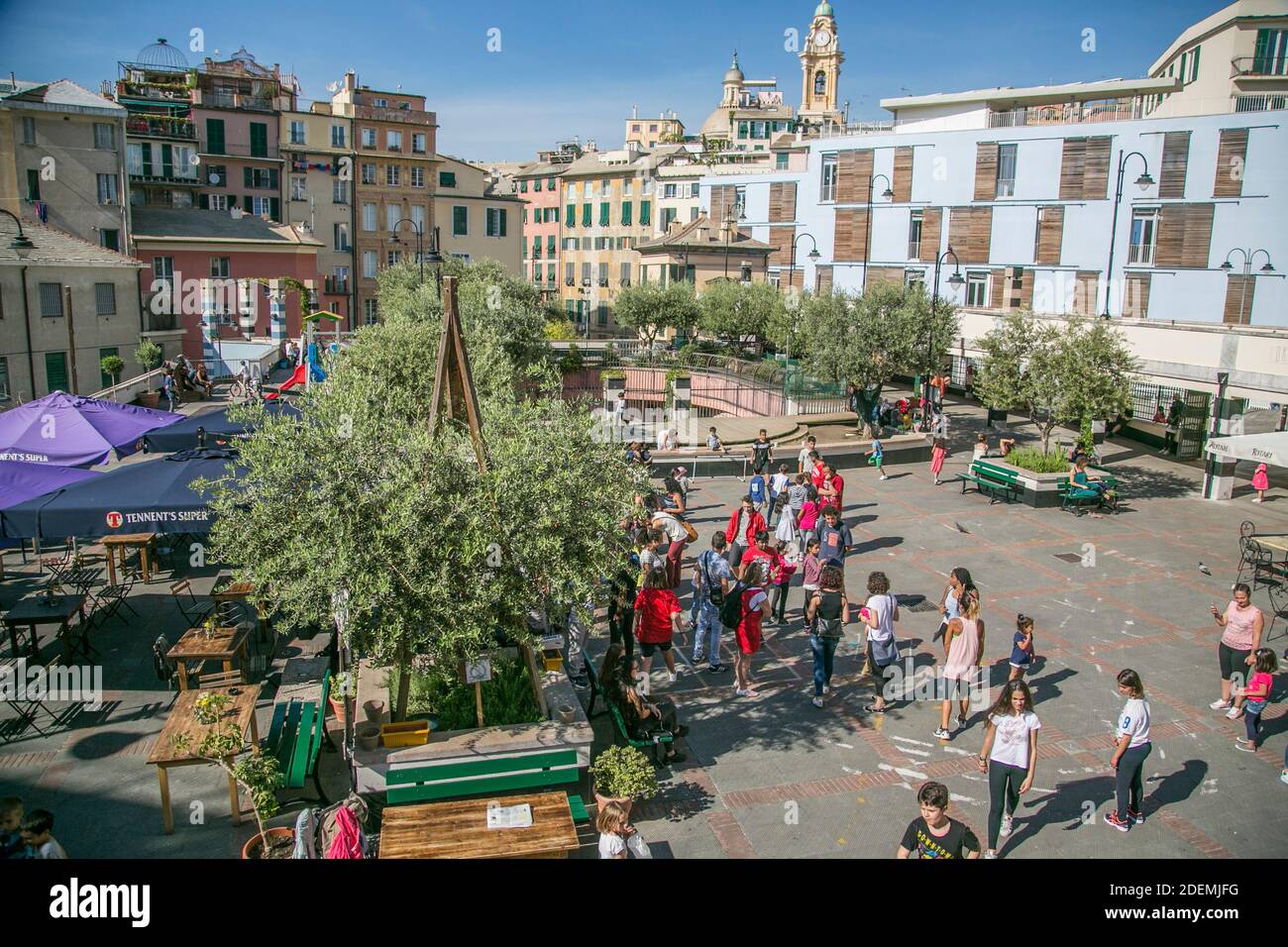 Children gathering to play in a Piazza of Genova, Liguri Italy Stock ...