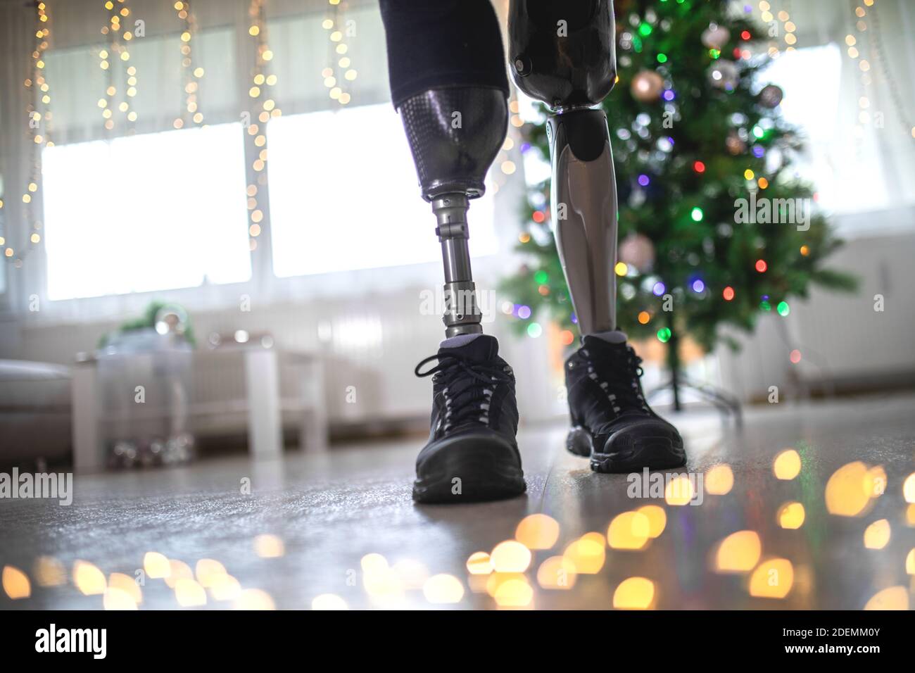 Legless man with prosthesis at Christmas Stock Photo - Alamy