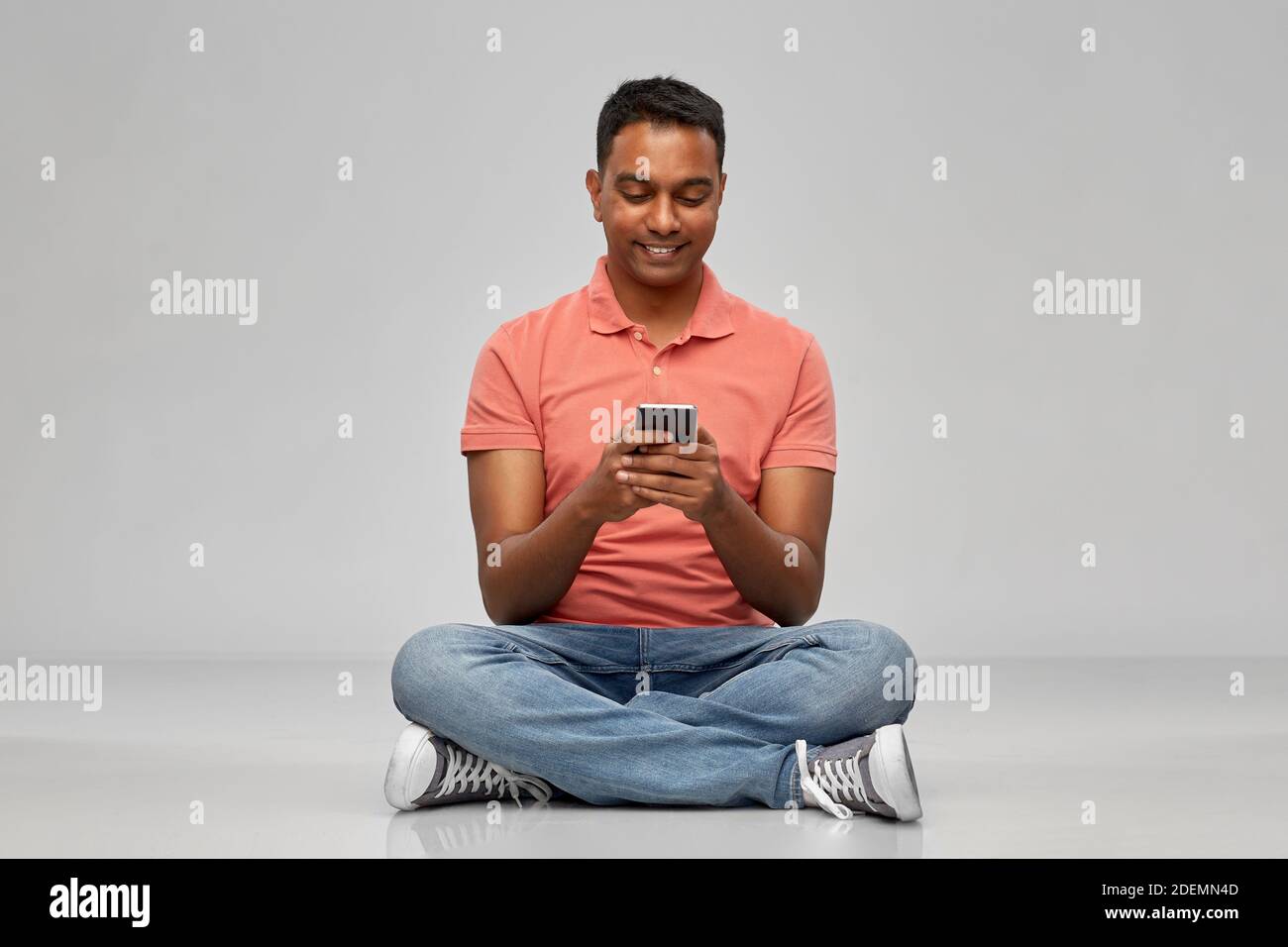 happy indian man using smartphone Stock Photo - Alamy
