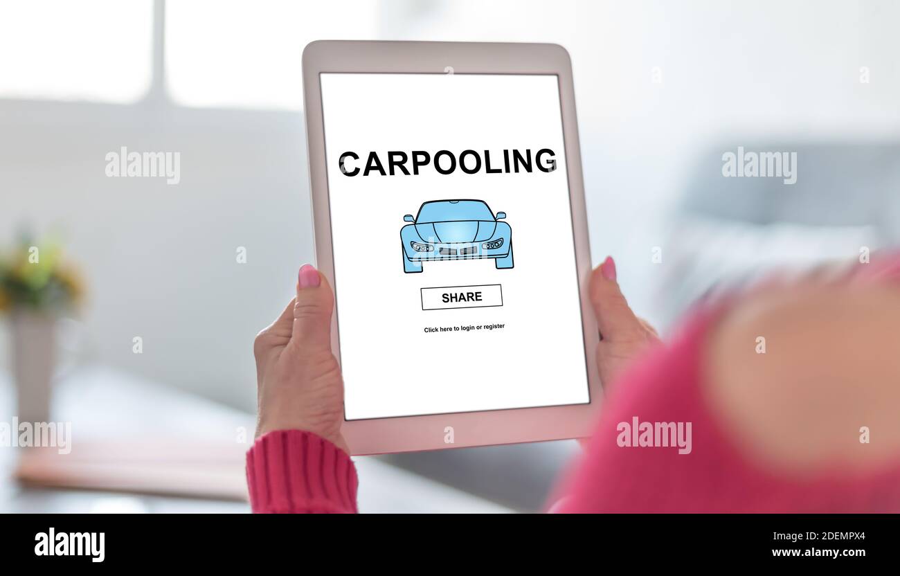 Tablet screen displaying a carpooling concept Stock Photo - Alamy