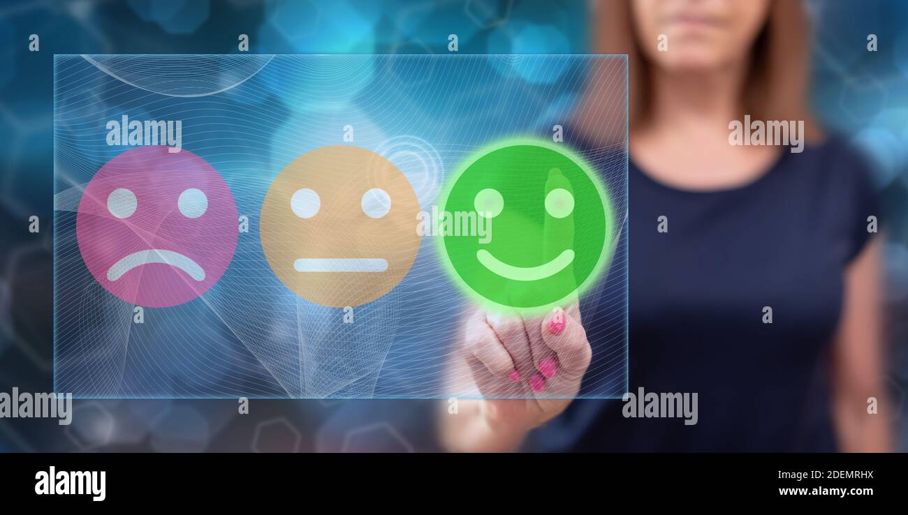 Woman touching a customer satisfaction concept on a touch screen with ...