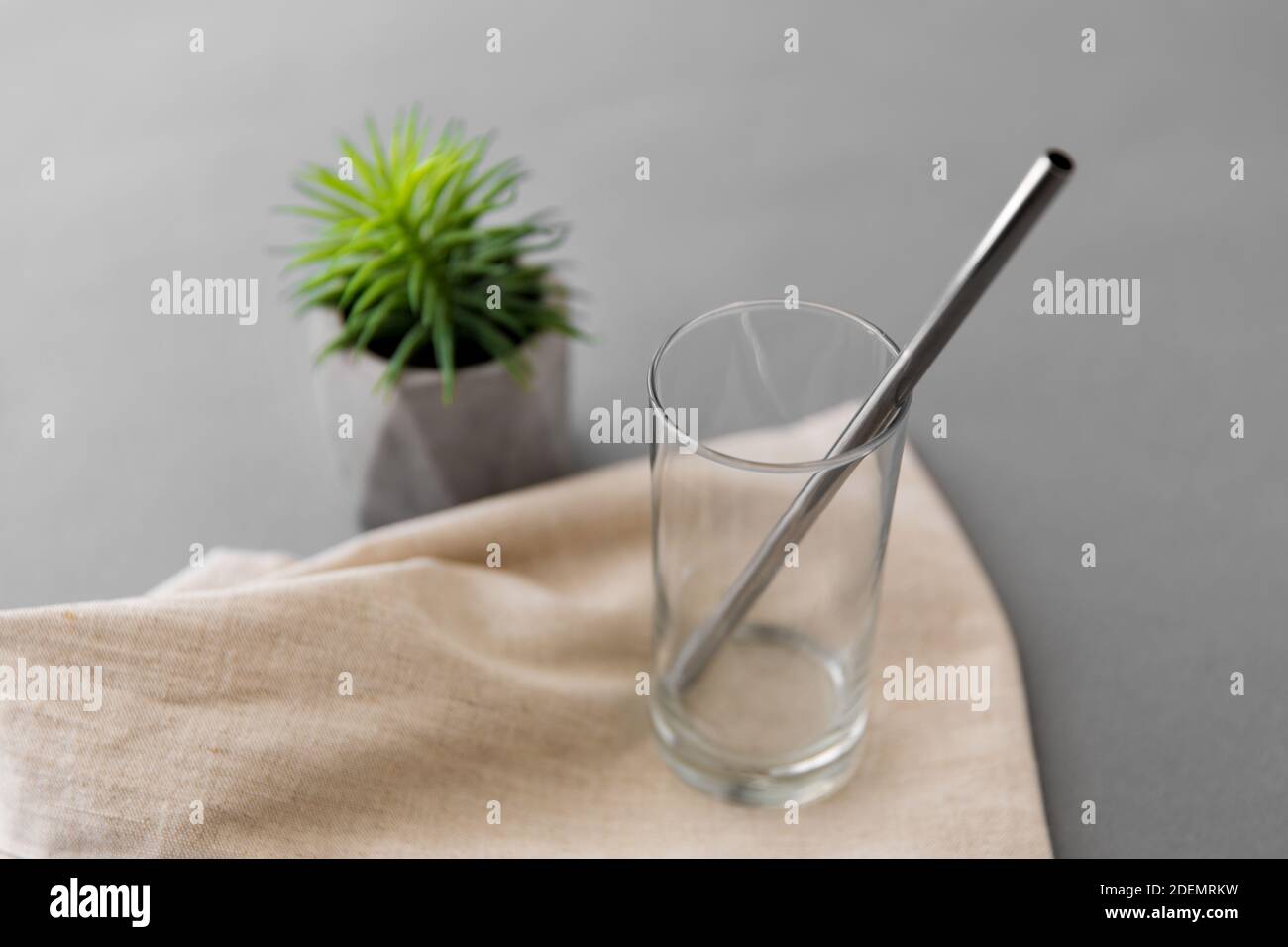 empty glass mug of with reusable metallic straw Stock Photo - Alamy