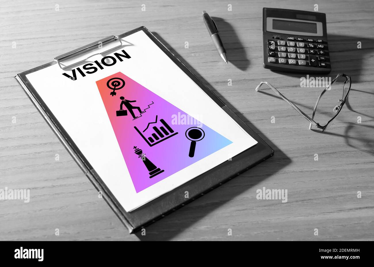 Vision concept on a clipboard with a calculator Stock Photo - Alamy