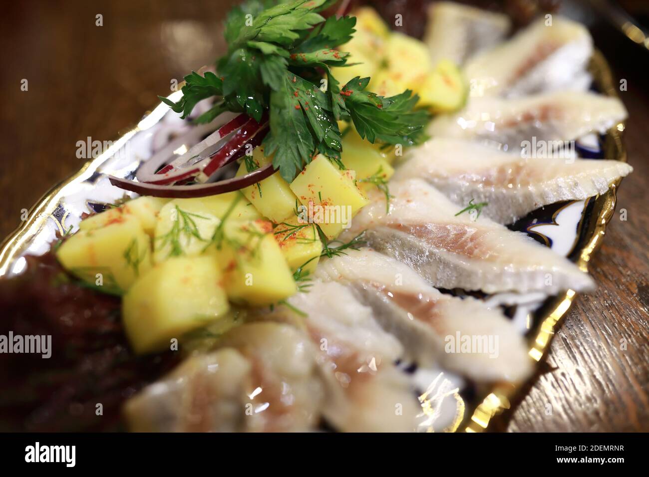 Herring fillet in oil potatoes hi-res stock photography and images - Alamy