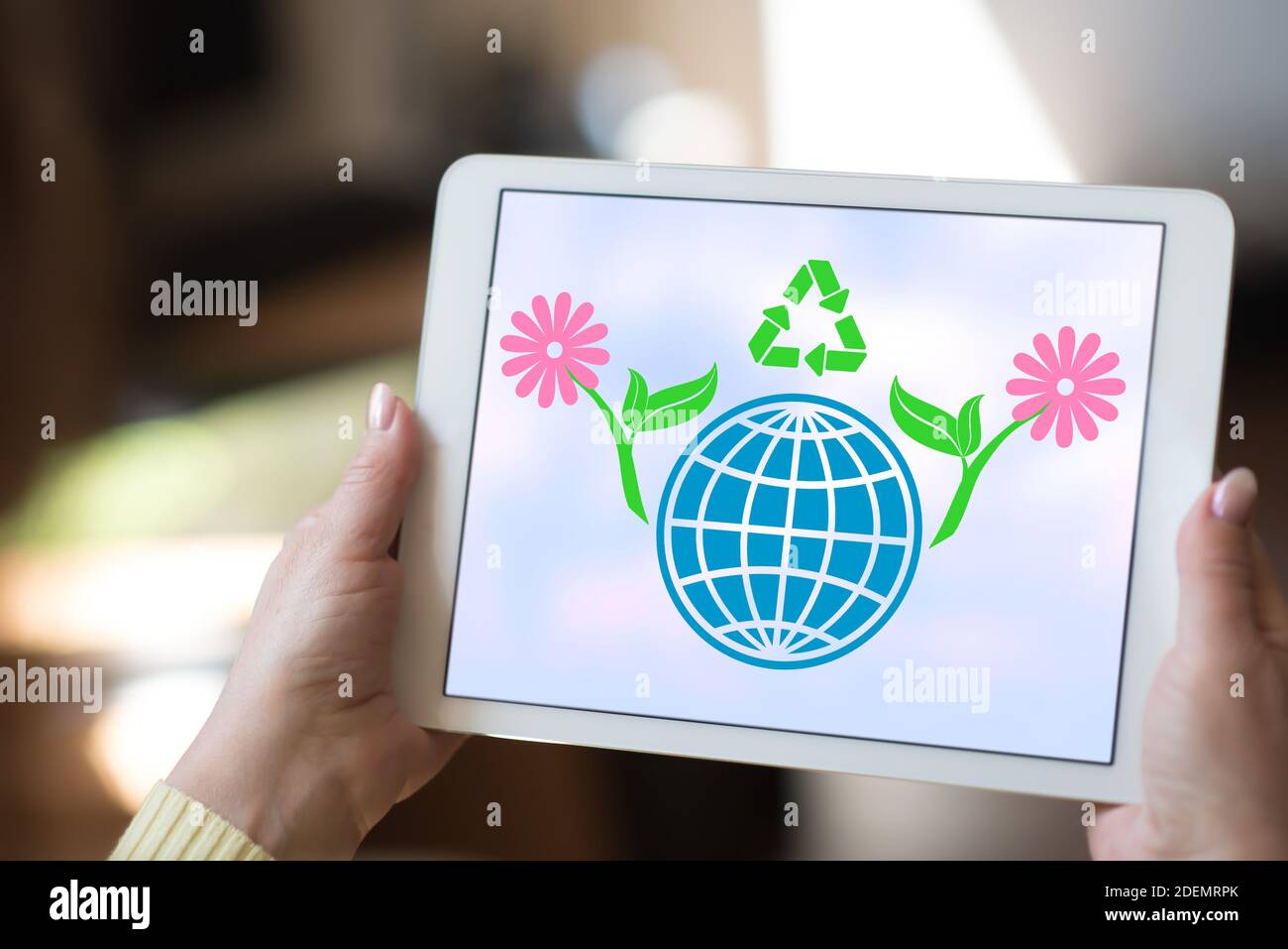 Tablet screen displaying a recycling concept Stock Photo - Alamy