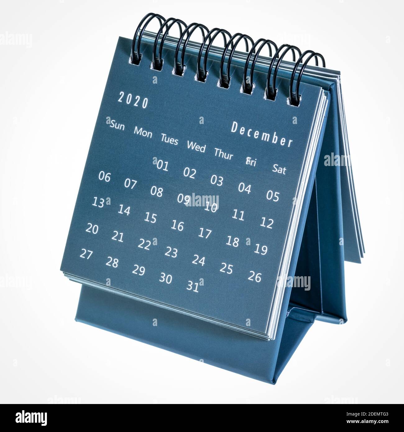 December 2020 - spiral desktop calendar isolated on white, time and ...