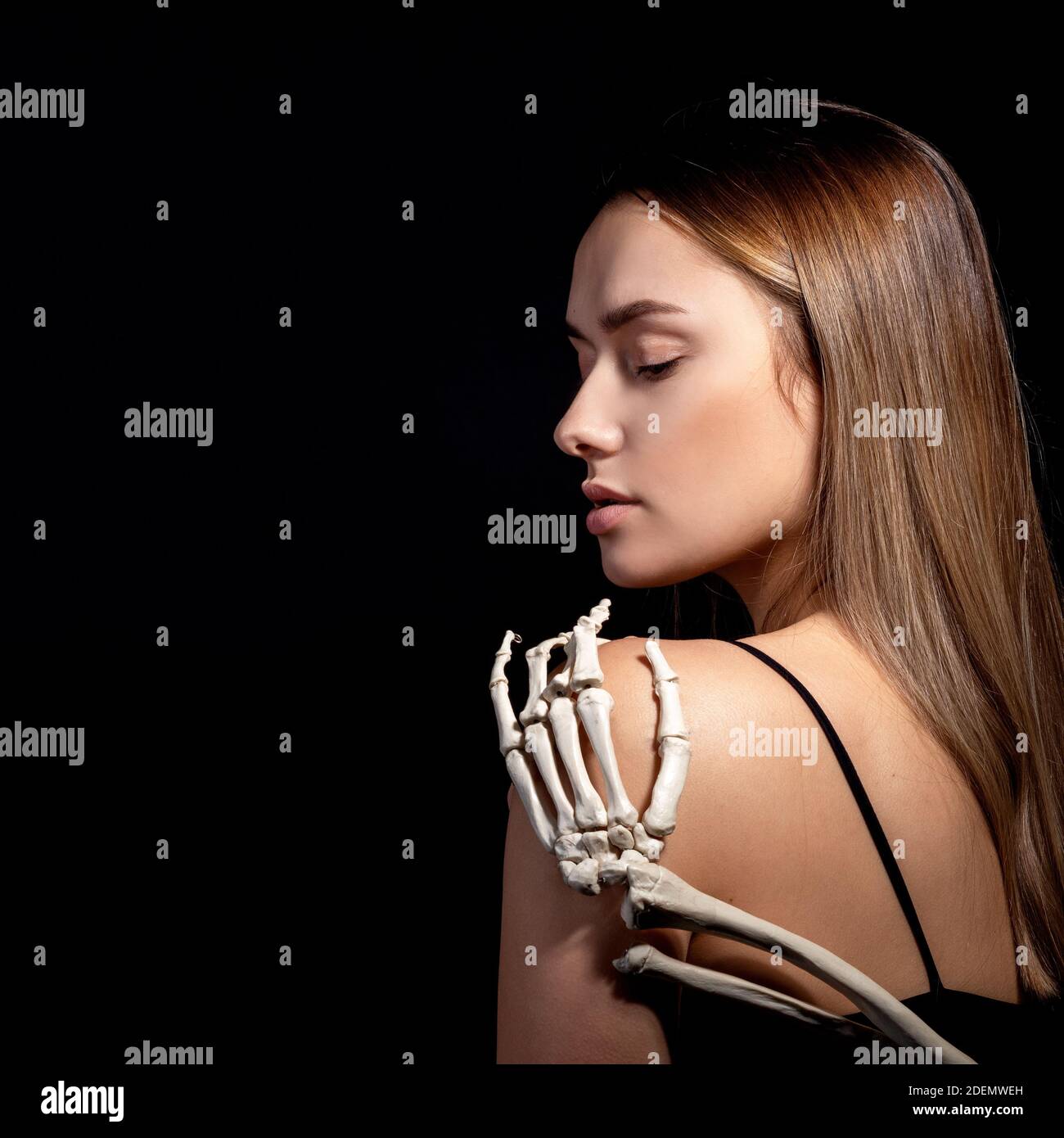 Skeleton Hand Grabbing Shoulder