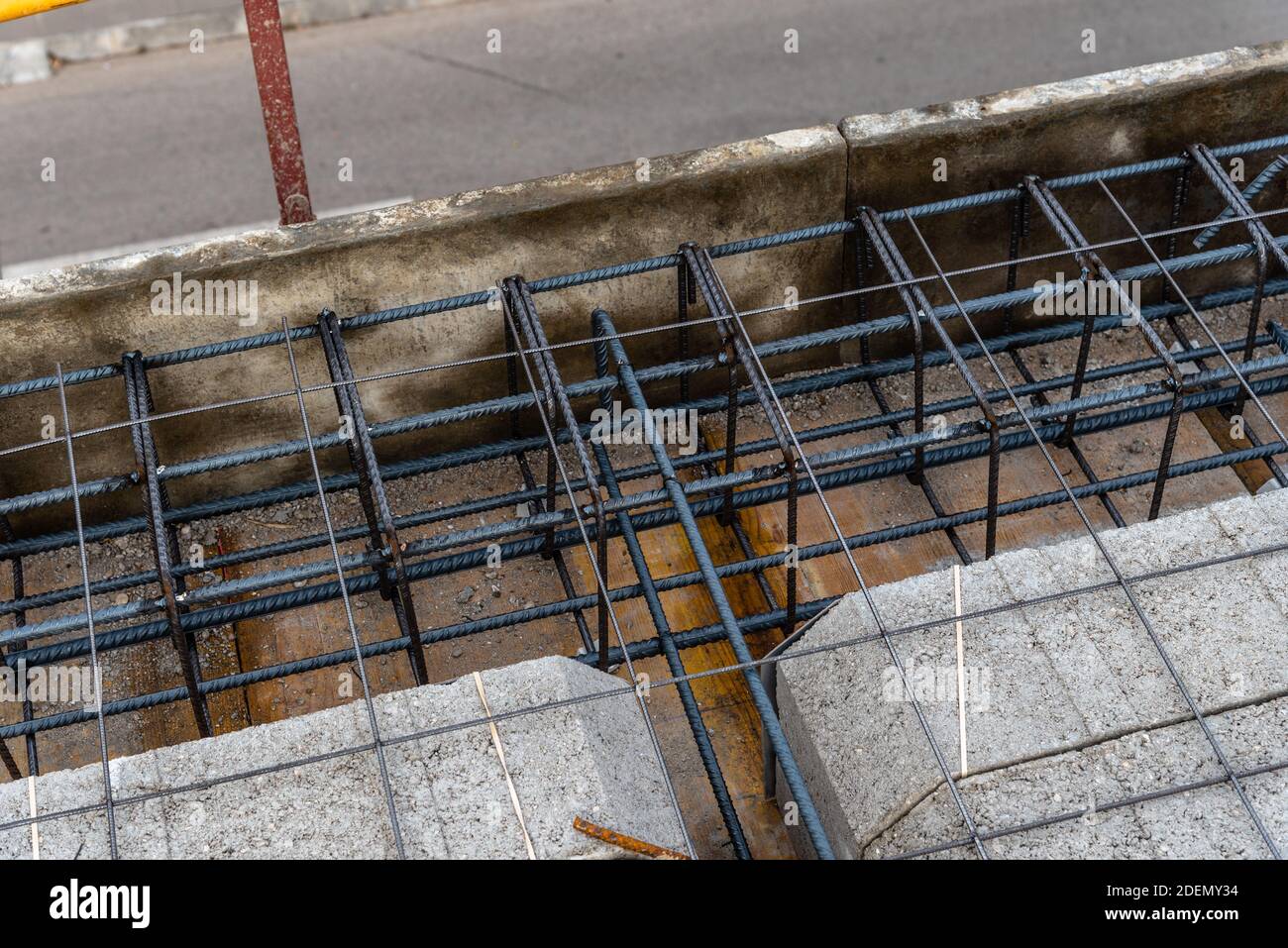 Construction site with steel formworks and reinforcing bars for pillars ...