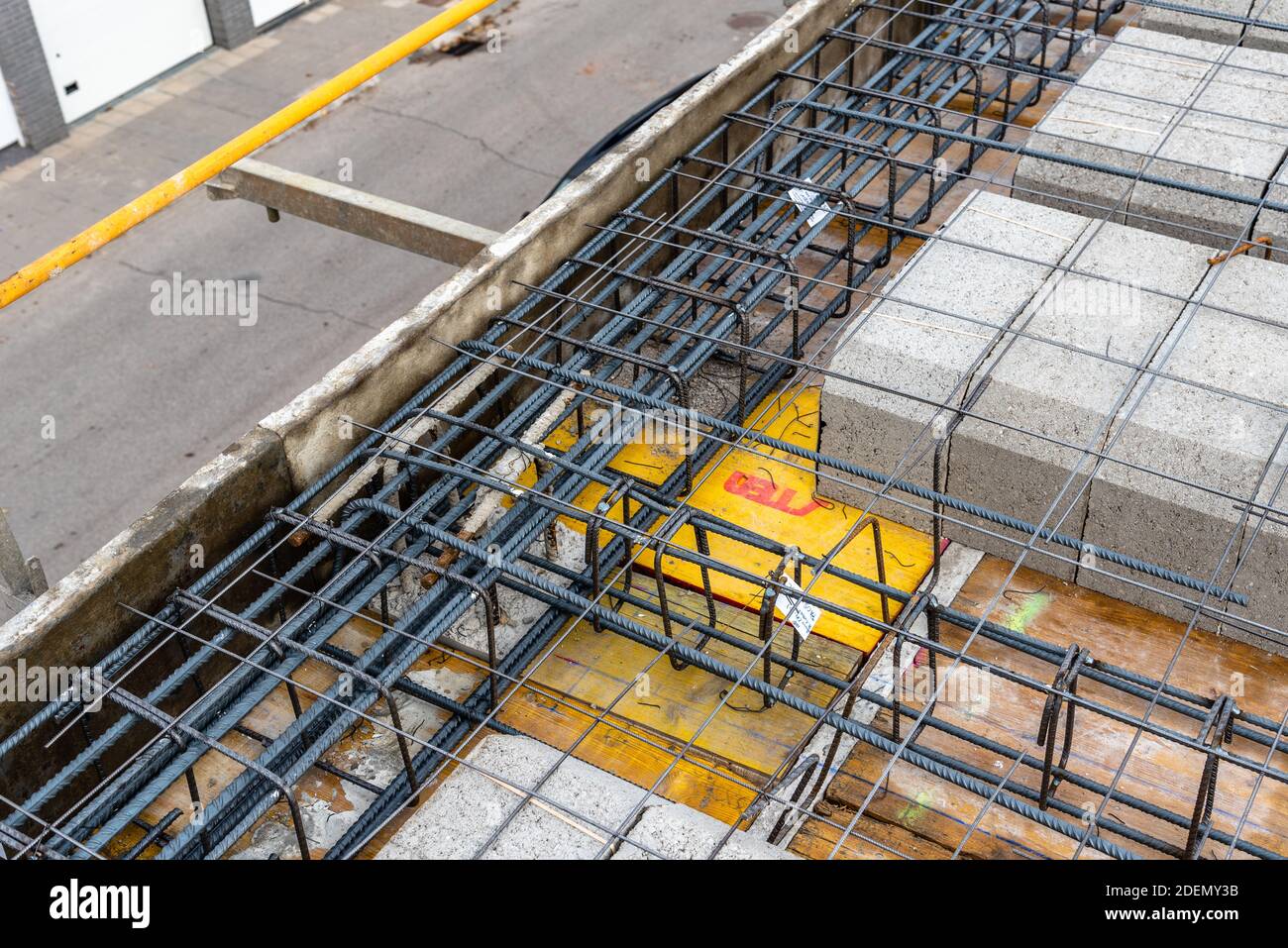 Construction site with steel formworks and reinforcing bars for pillars ...