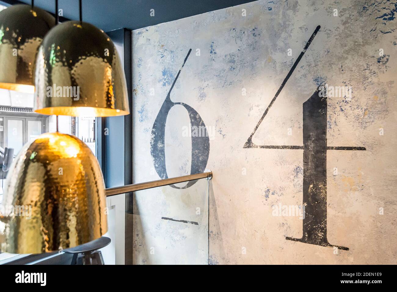 Entrance with artwork on the wall. Salon 64, London, United Kingdom ...