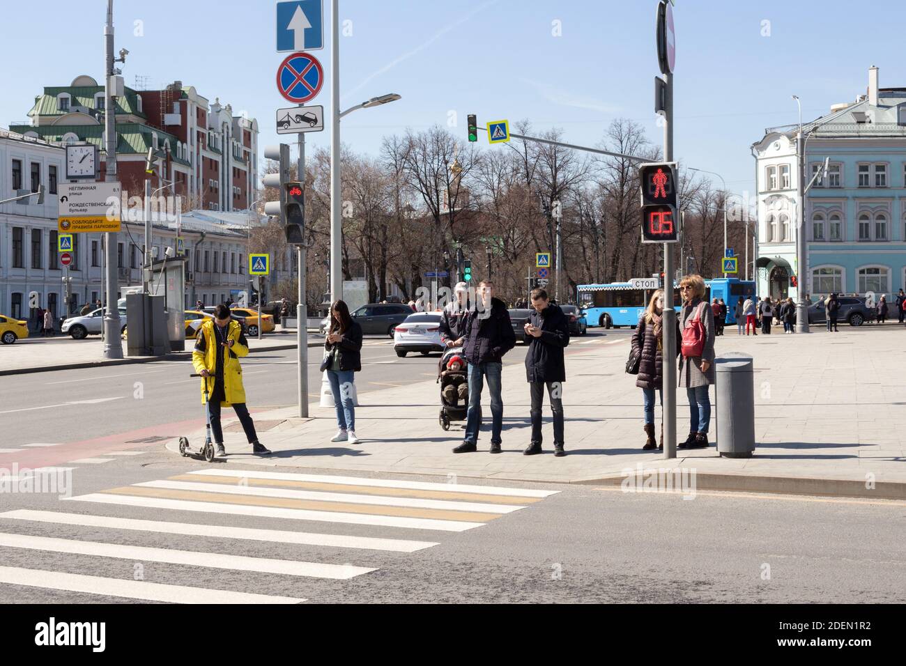 Moscow, Russia, 11 April, 2019: People are waiting for the green ...