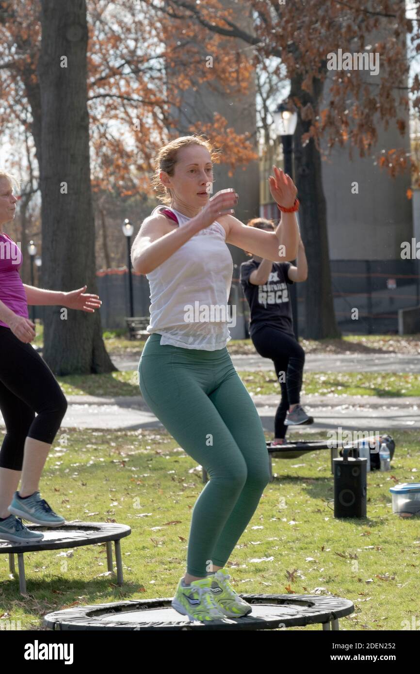 Women in an Urban Rebounding class dancing while on a small trampoline ...