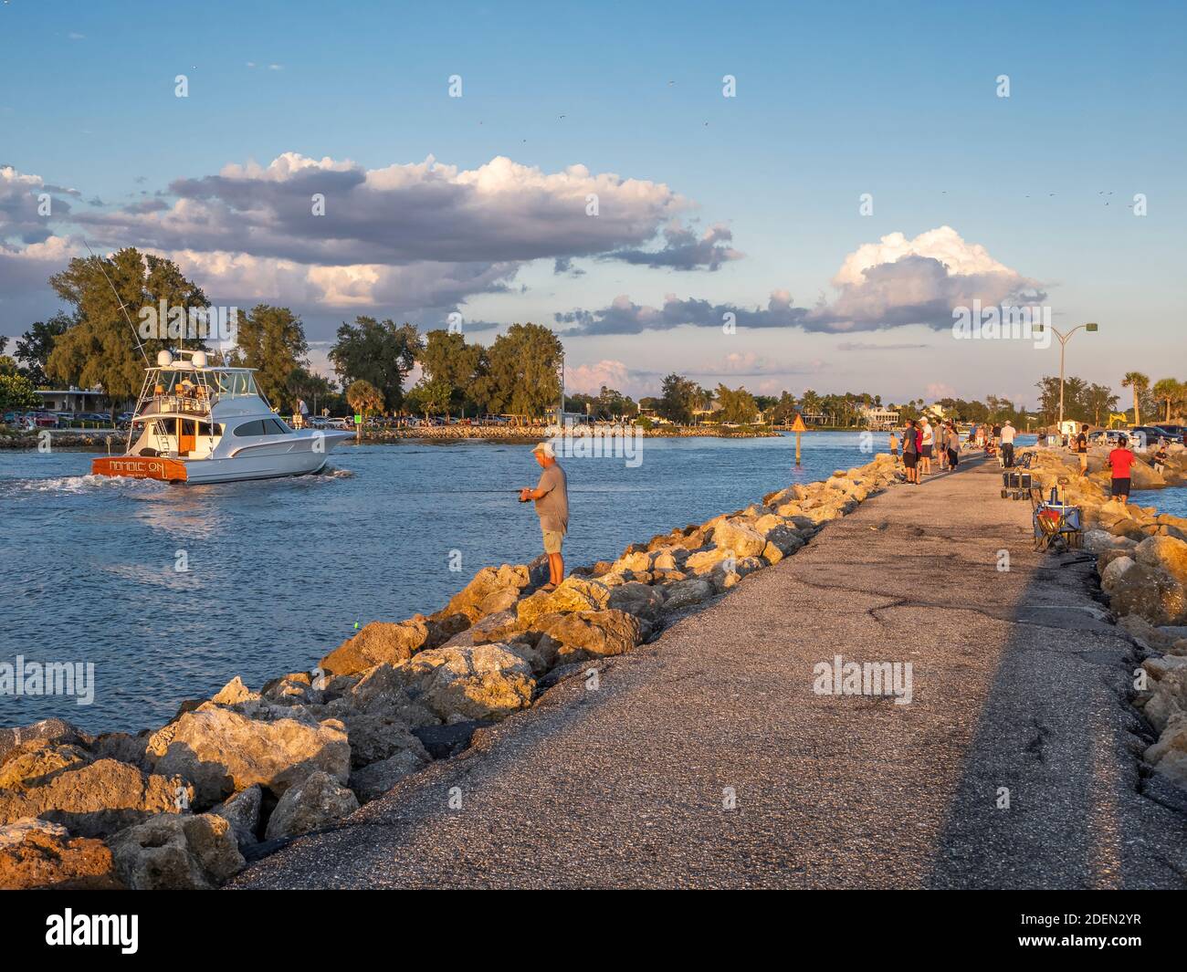 Late afternoon sun on the Jetty in Venice Florida Stock Photo - Alamy