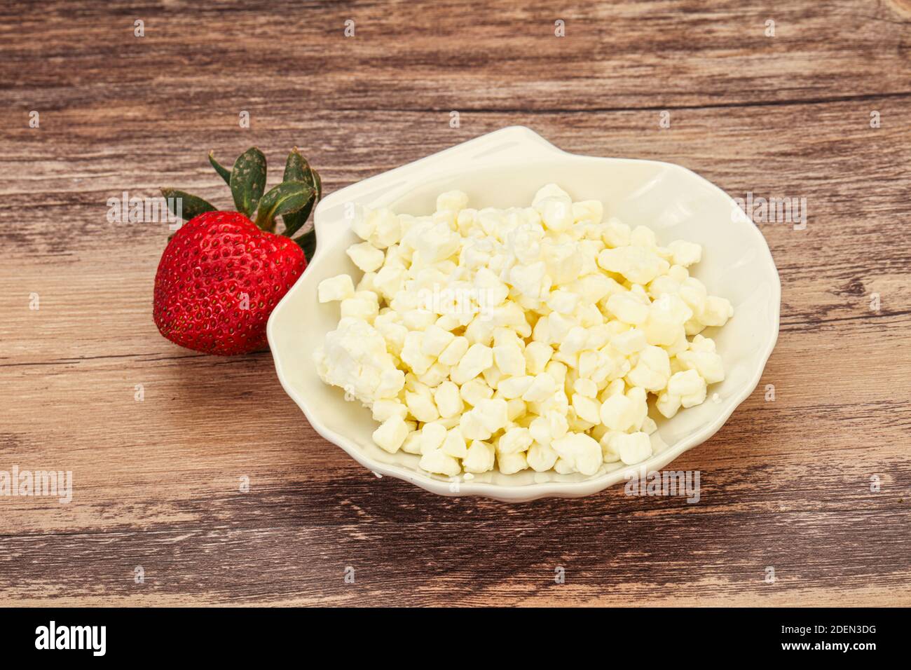 Dietary food - grain cottage cheese in the bowl Stock Photo - Alamy