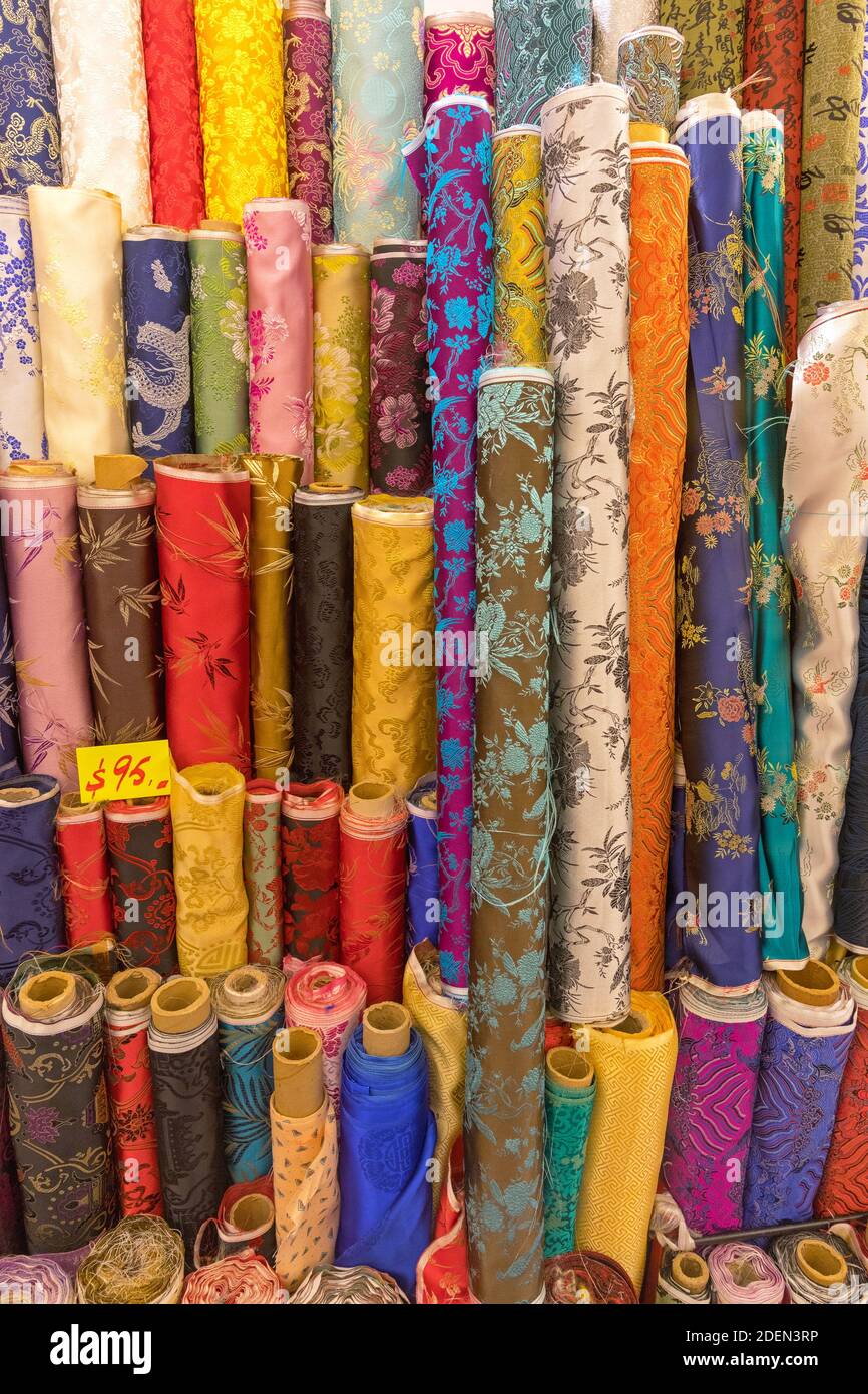 Colourful Textile Material in Rolls at Wholesaler Stock Photo - Alamy