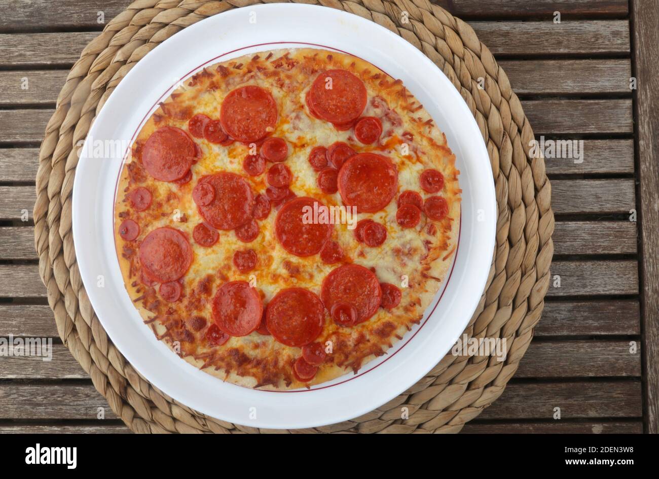 pepperoni pizza as fast food typical italian Stock Photo - Alamy