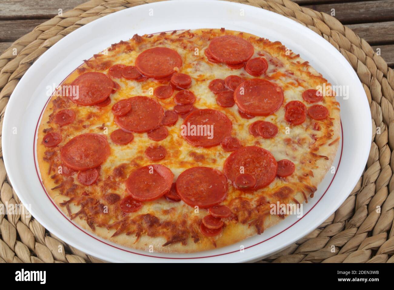 pepperoni pizza as fast food typical italian Stock Photo - Alamy