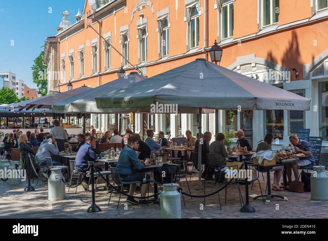 People at sunny restaurant terraces in Turku Finland Stock Photo - Alamy