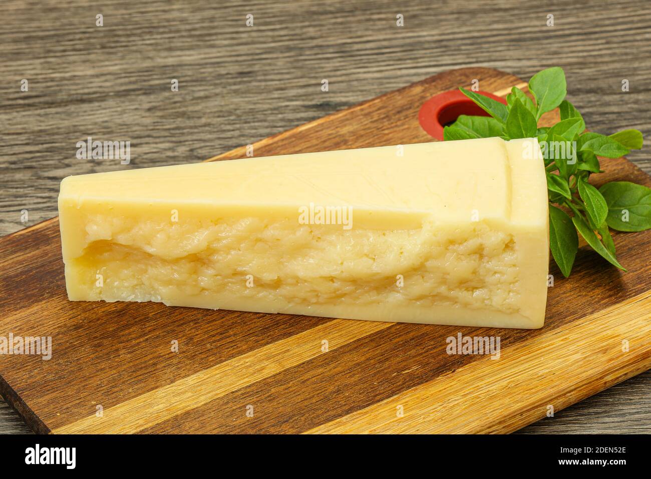 Hard parmesan cheese served basil leaves Stock Photo - Alamy
